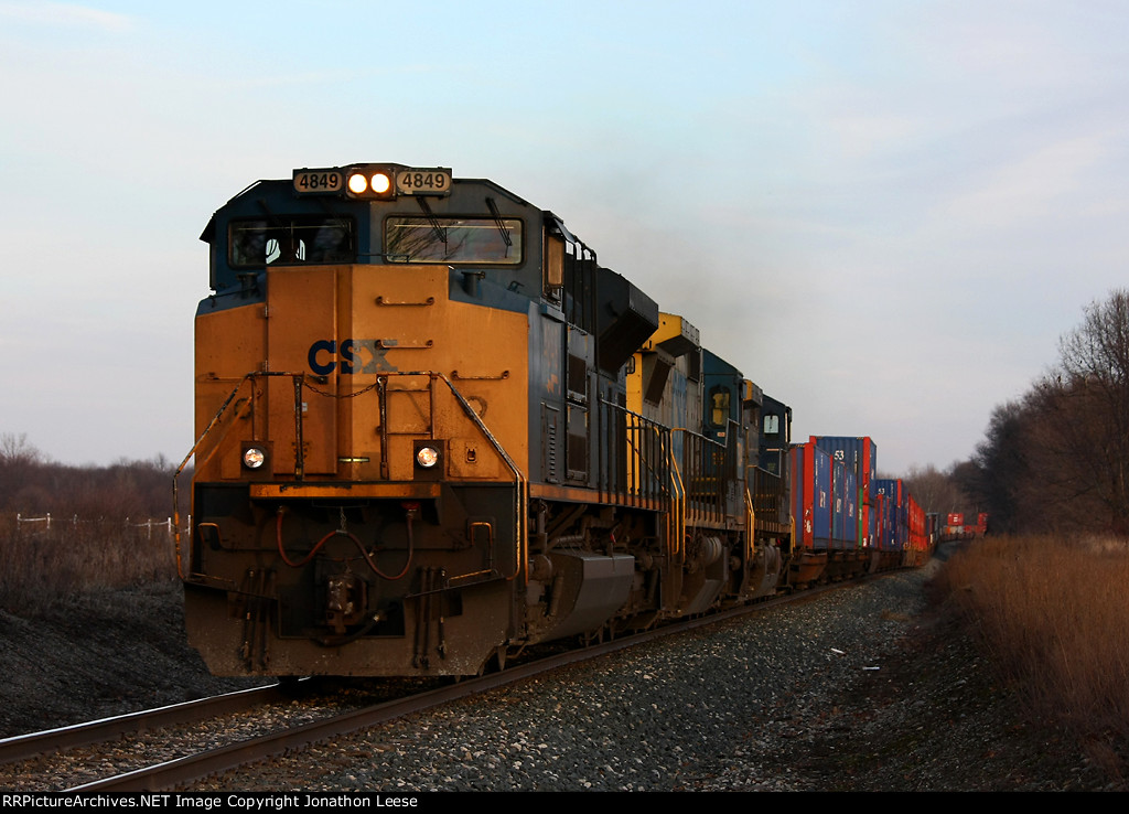 Q161, another re-routed stack train, rolls west up the slight hill to Elmdale